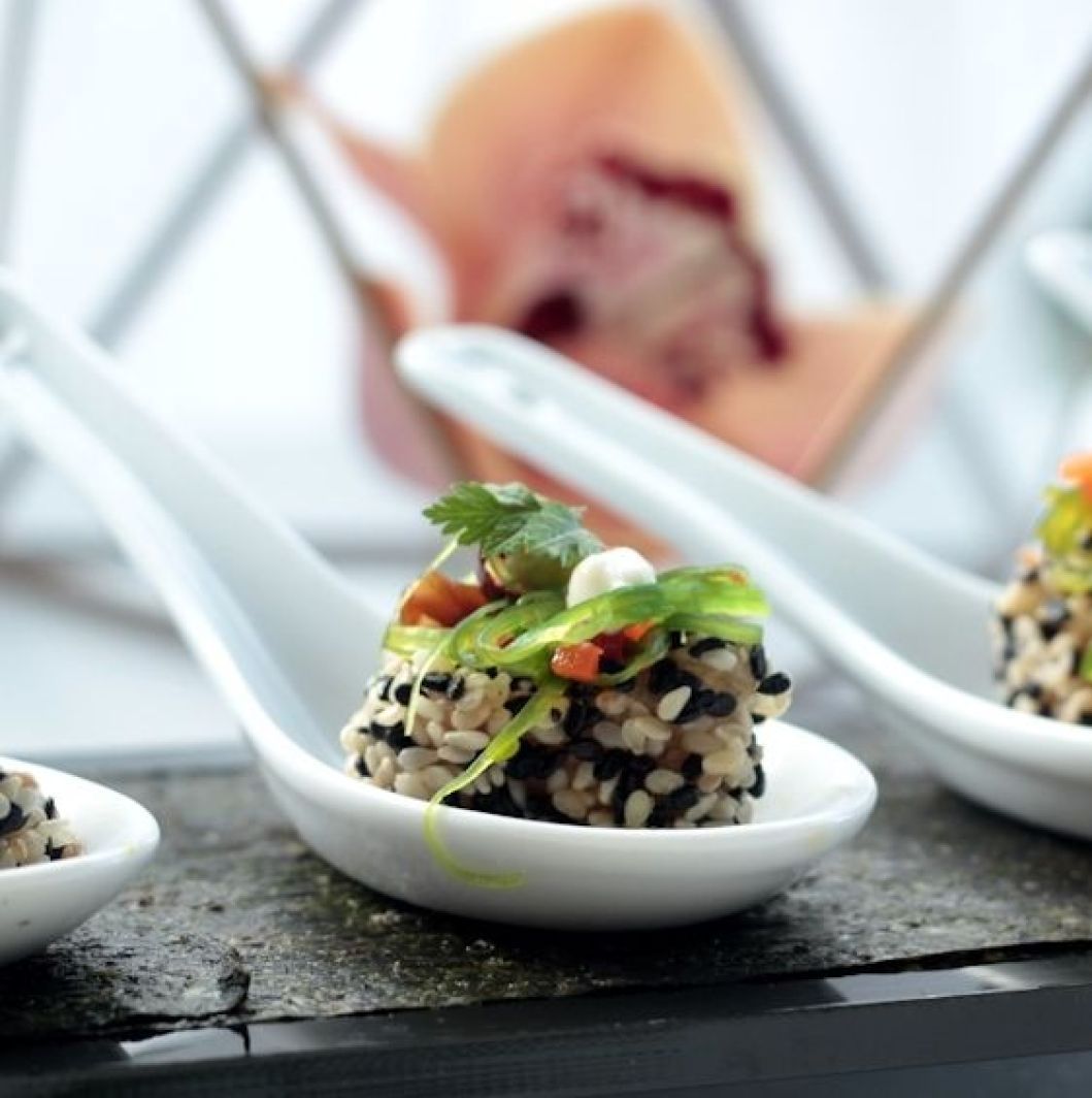 Selection of fish spoons with seaweed salad and wasabi pea ponzu ...
