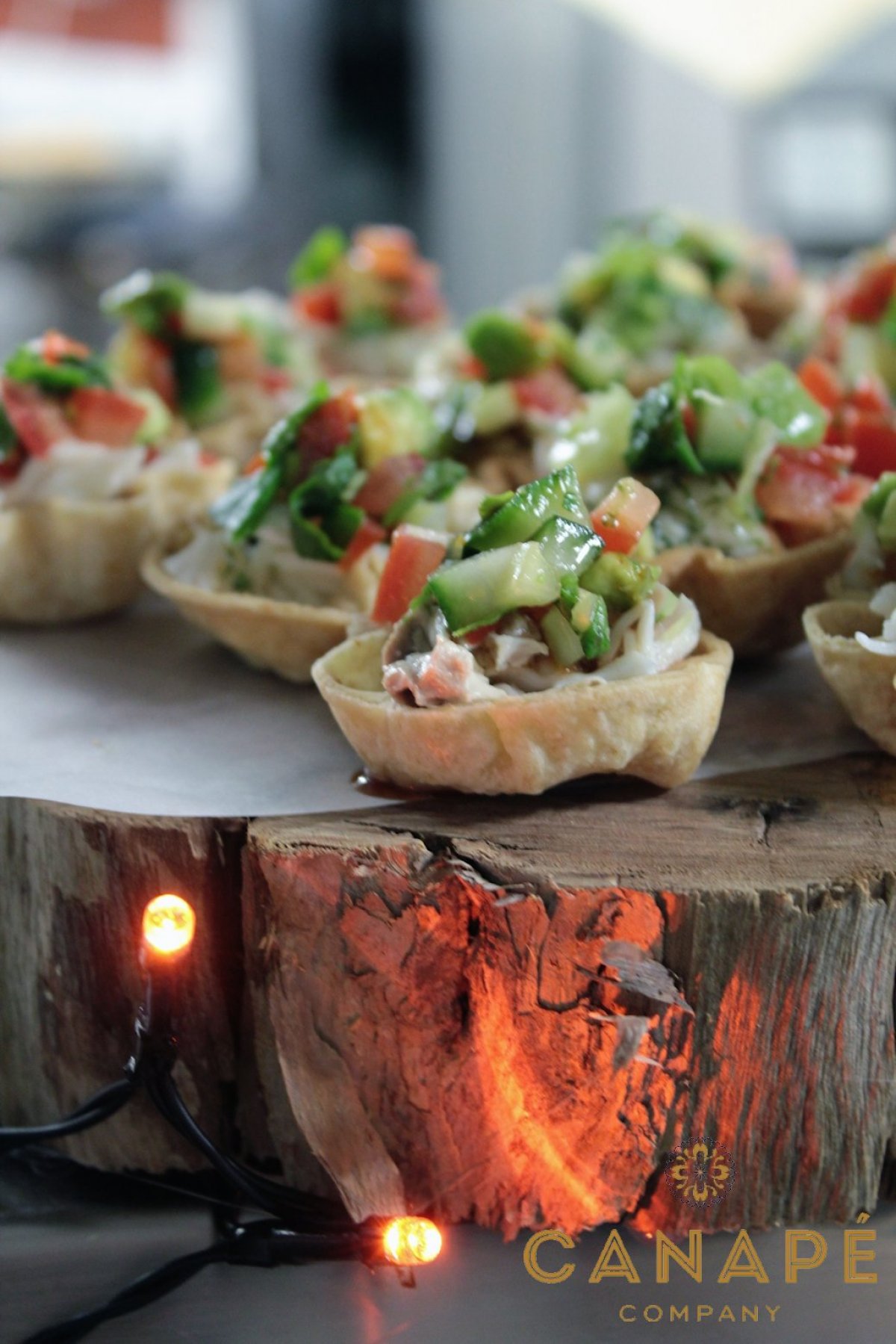 Tostada basket cajun chicken, tomato avocado salsa